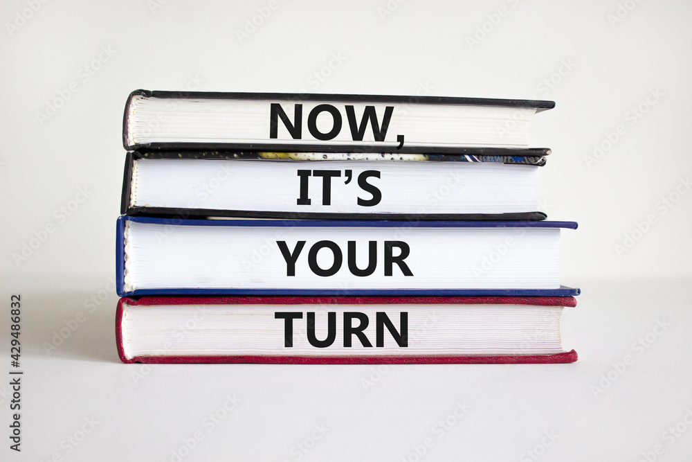 It is your turn symbol. Books with words 'now, it is your turn' on ...