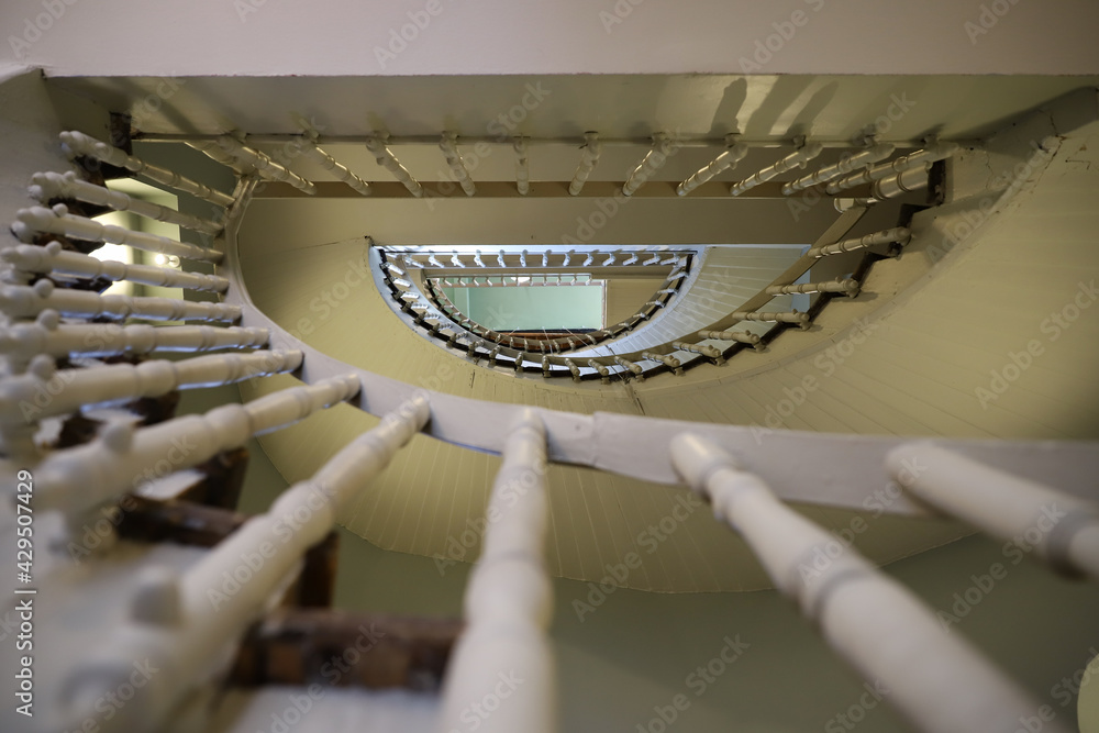 Old and Spiral stairs inside a building Stock Photo | Adobe Stock