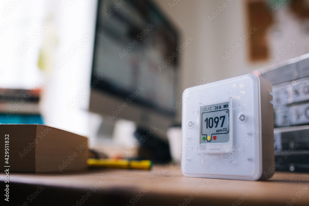 CO₂ sensor monitor. Indoor air quality sensor. Healthy work environment ...
