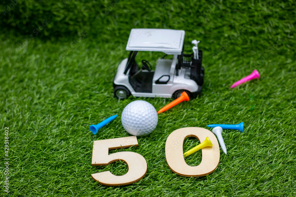 Golf 50th Birthday with buggy golf cart and number fifty are on green ...