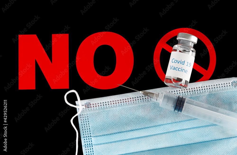 Covid 19 Vaccine Bottles with Needle and Syringe on a NO sign Stock ...