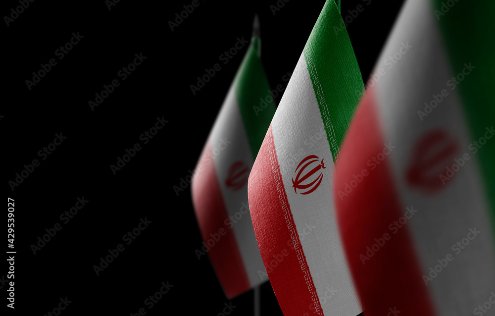 Small national flags of the Iran on a black background Stock Photo ...
