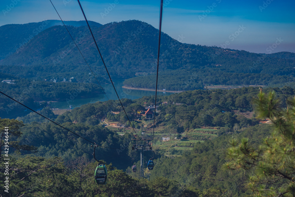 Circulating cable car between Dalat bus station and Robin Hill Truc Lam ...