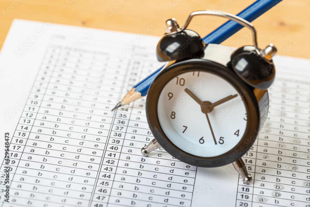 alarm clock, optical form of standardized school test with bubble and ...
