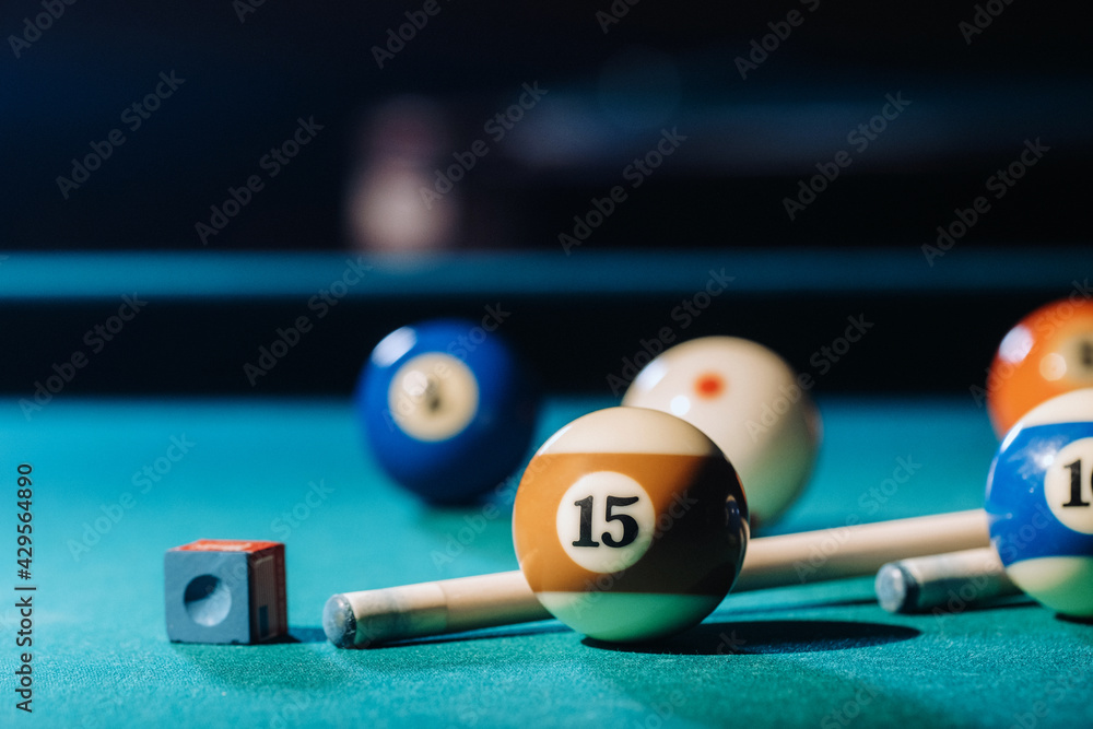 Billiard table with green surface and balls in the billiard club.Pool ...