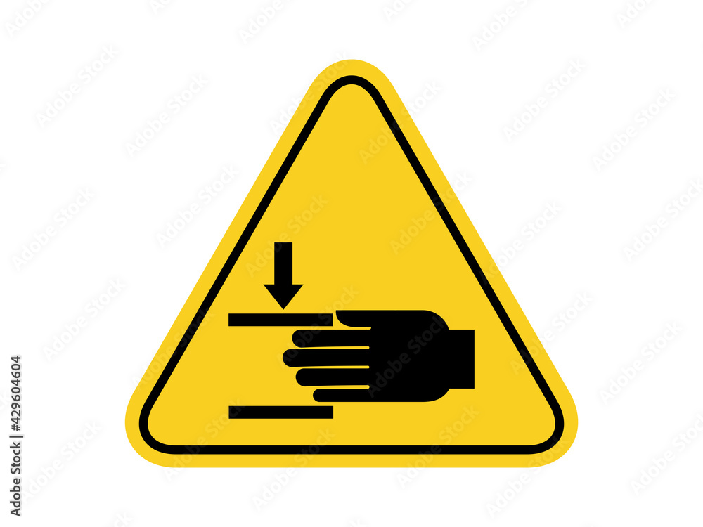 isolated watch out crushing hand, common hazards symbols on yellow ...