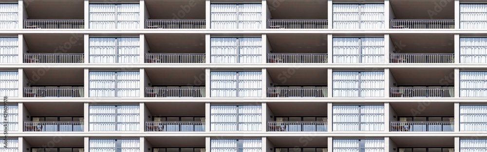 Panorama of Windows on the tall buildings of the office building ...