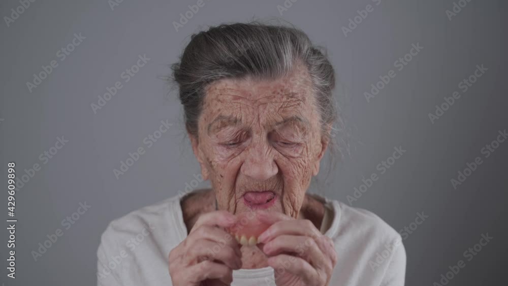 Very old Caucasian senior woman 90 years old with deep wrinkles and ...