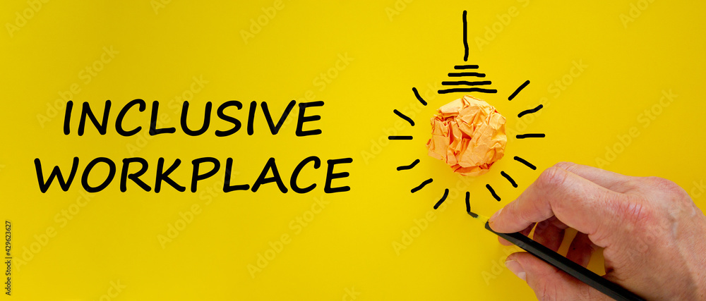 Inclusive workplace symbol. Businessman writing words 'Inclusive ...