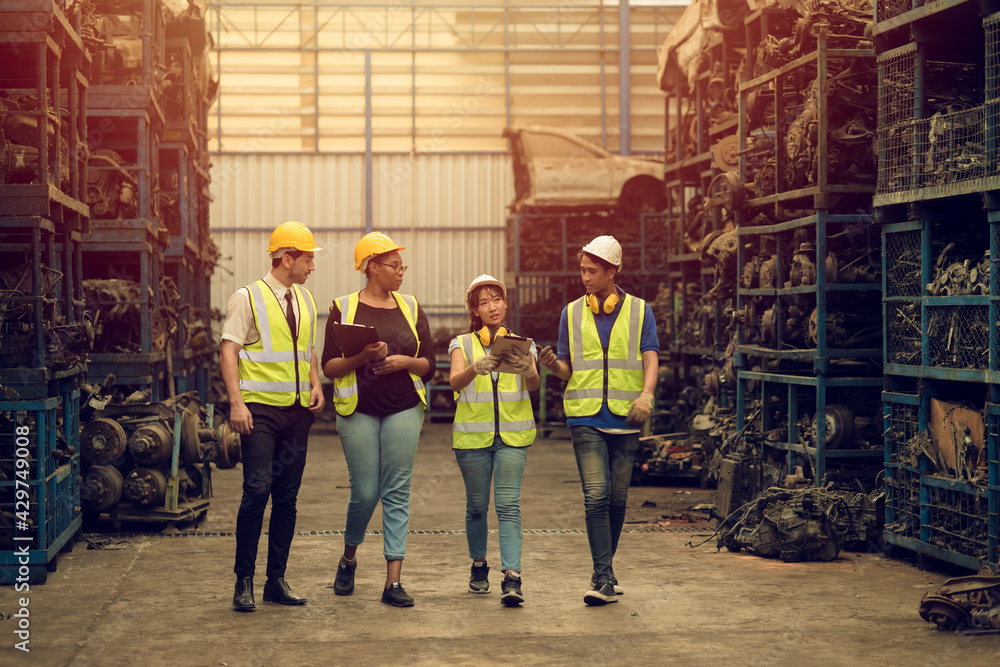 Group of Teamwork Worker mix race enjoy team working in heavy industry ...