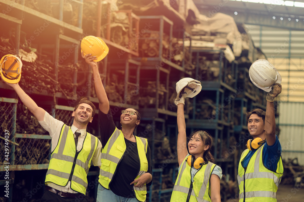 Group of Teamwork Worker mix race enjoy team working in heavy industry ...