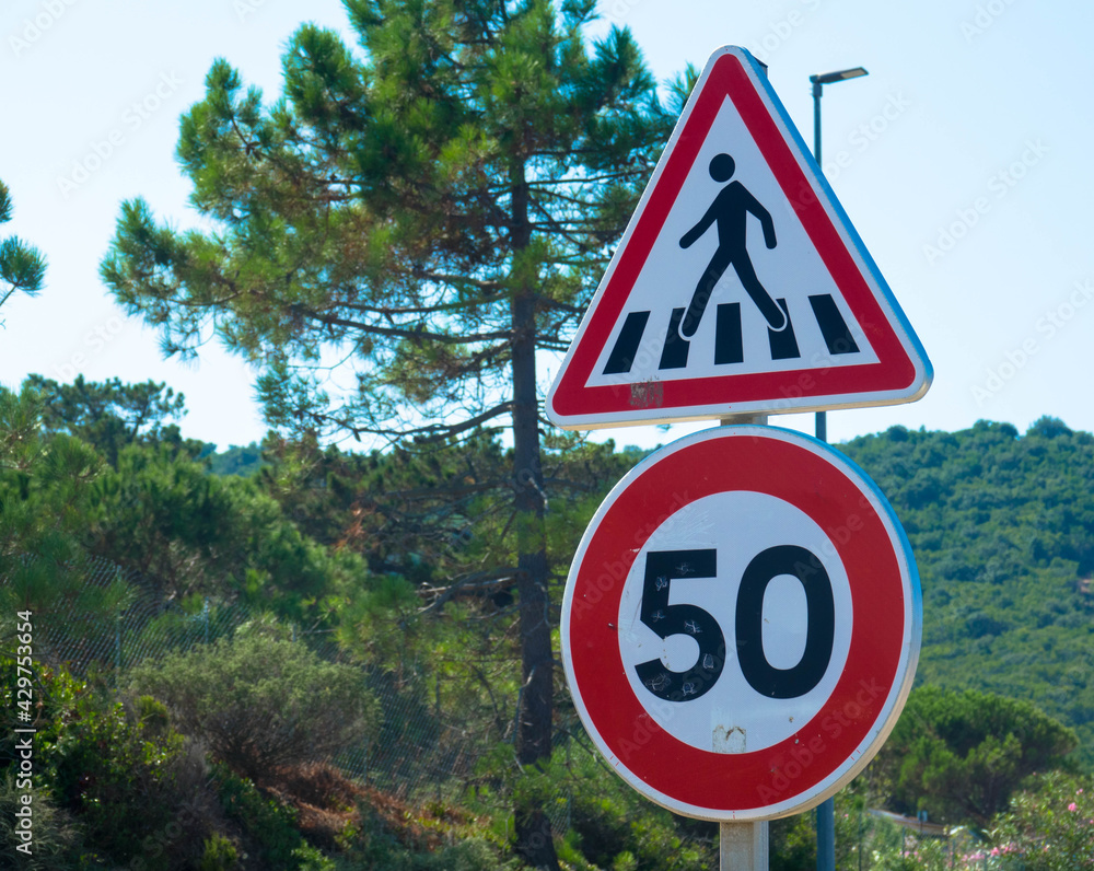Road sign warning pedestrian crossing and speed limit sign 50. Stock ...