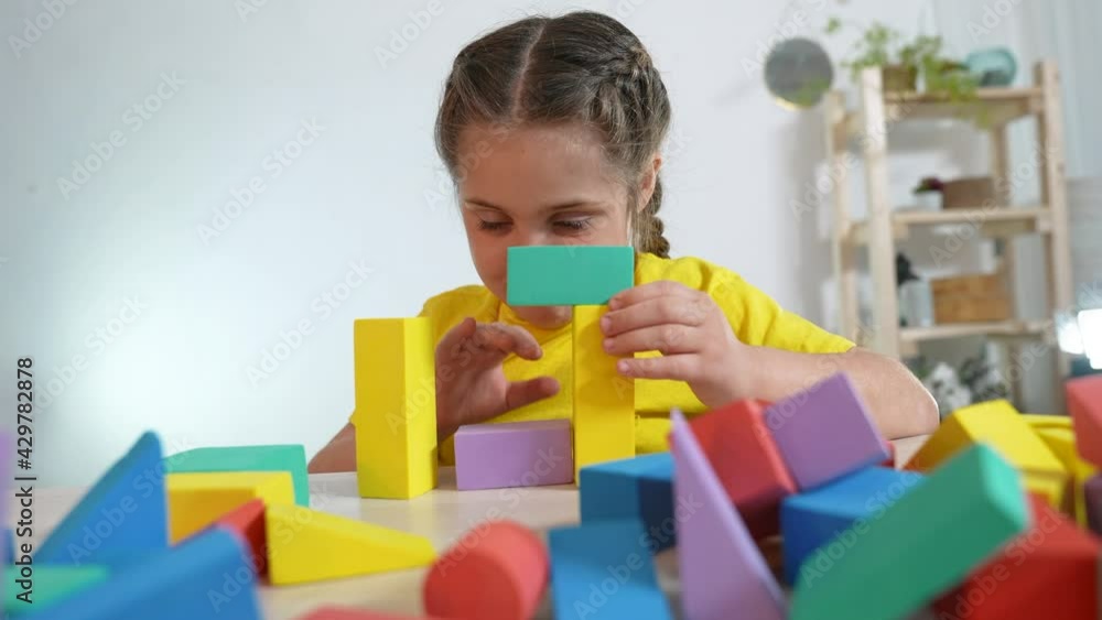 child play with cubes toys blocks. childhood kindergarten kid happy ...