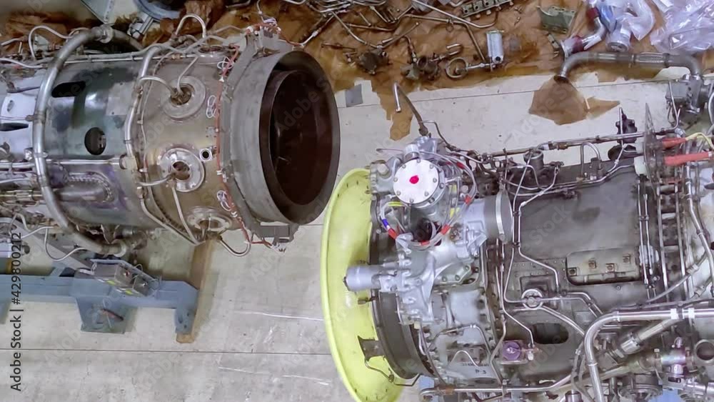 Soviet aircraft engine, standing on a pipe assembly stand. Jet engine ...