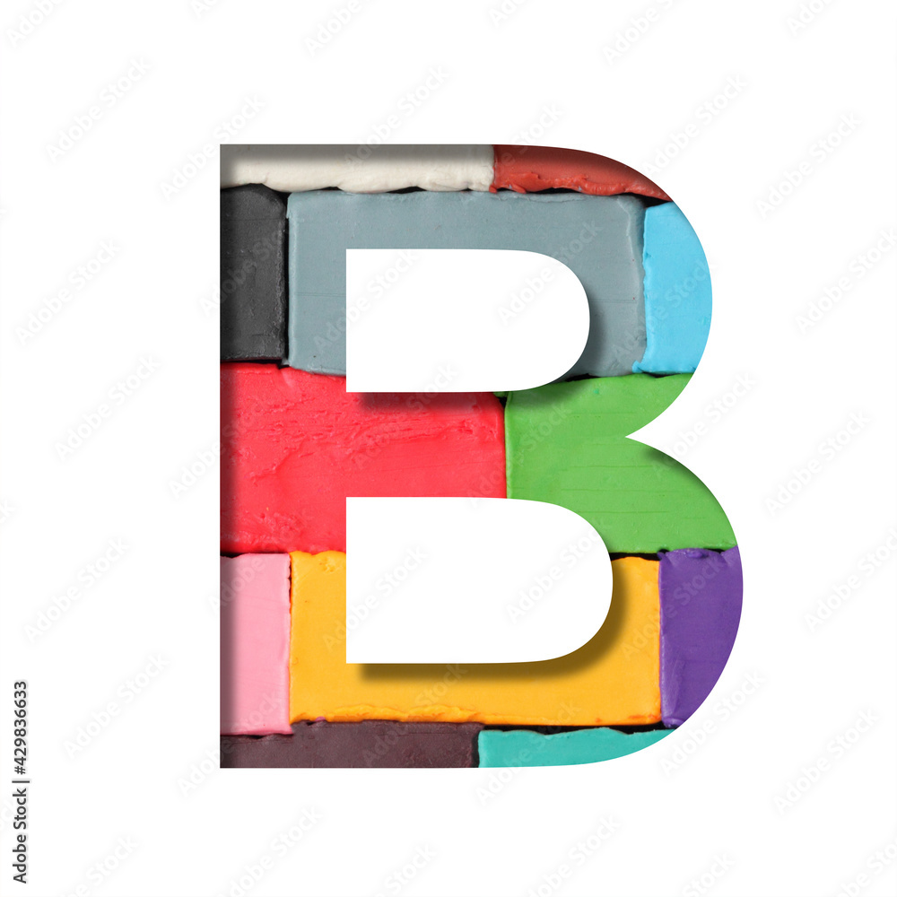 Multi-colored plasticine font. Letter B cut out of paper on a ...