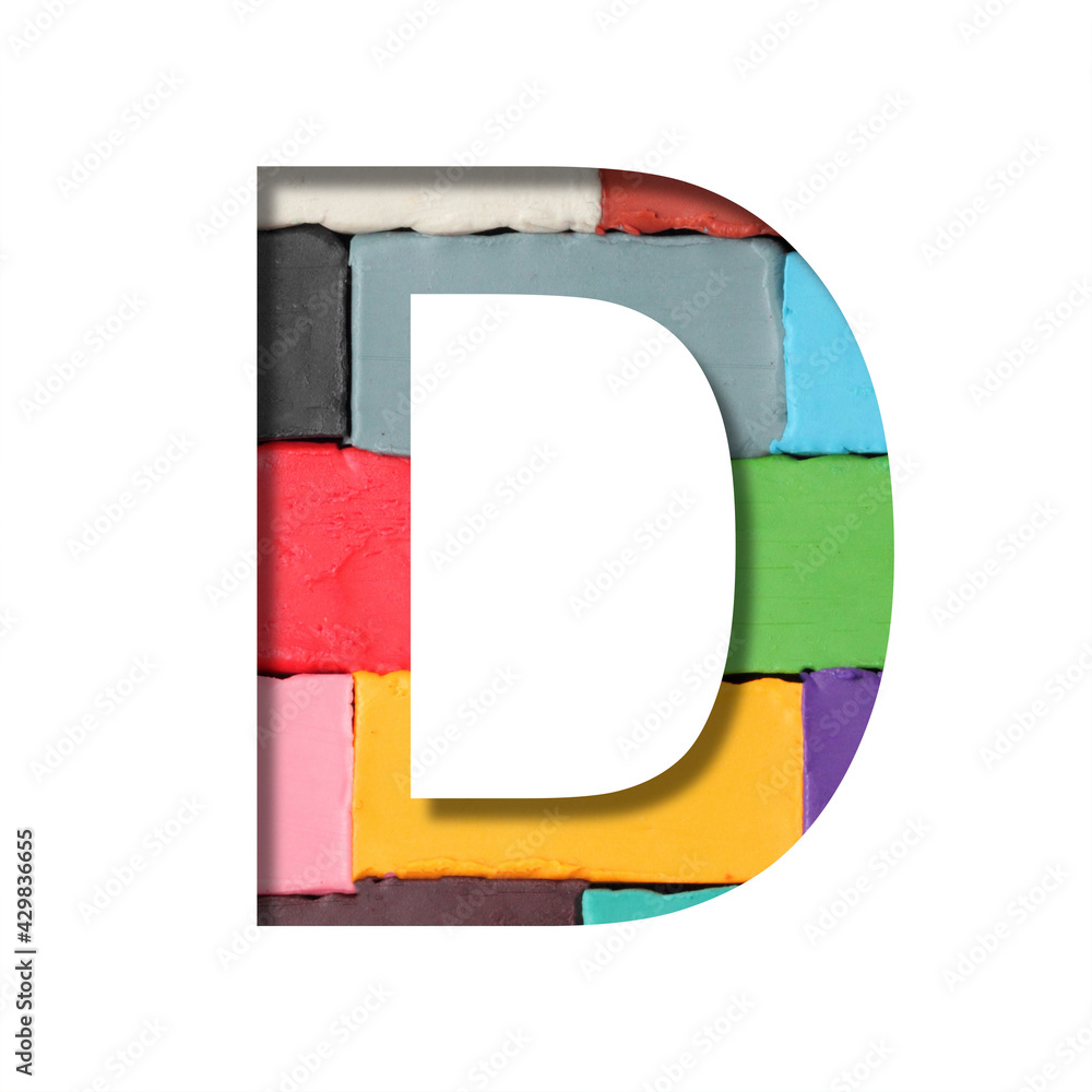 Multi-colored plasticine font. Letter D cut out of paper on a ...