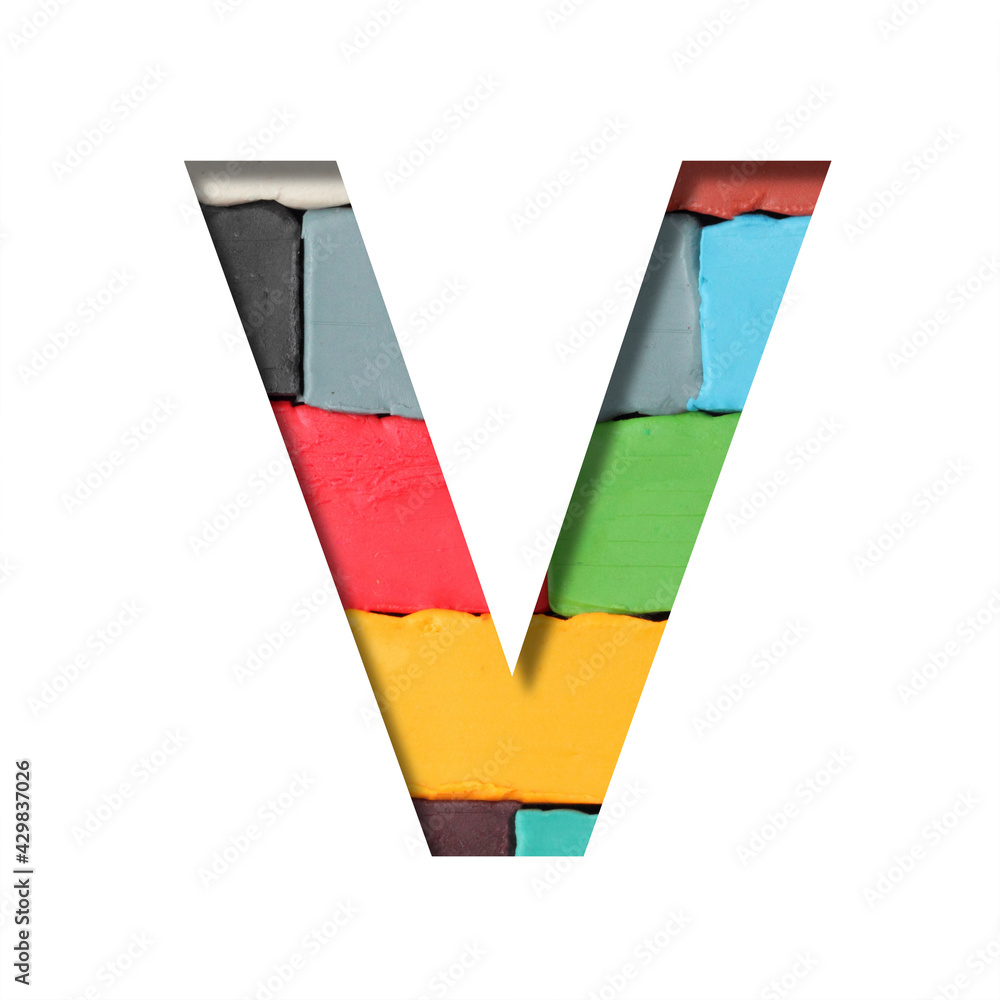 Multi-colored plasticine font. Letter V cut out of paper on a ...