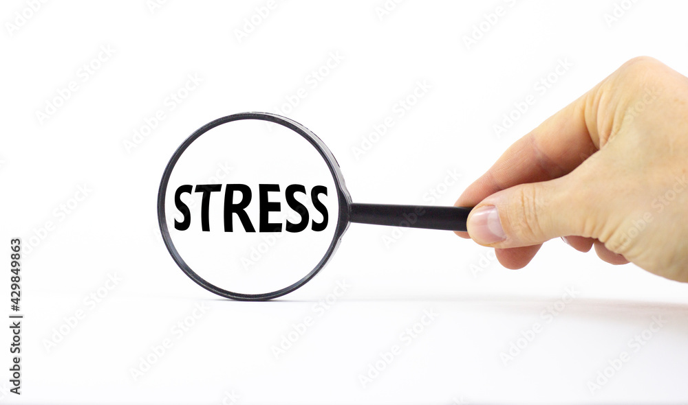 Stop stress and be health symbol. Magnifying glass with word stress on ...