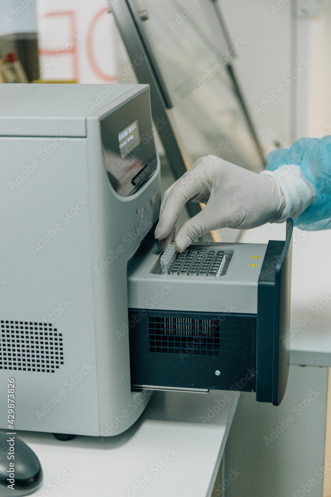 Young scientist, medical worker, tech or graduate student works in ...