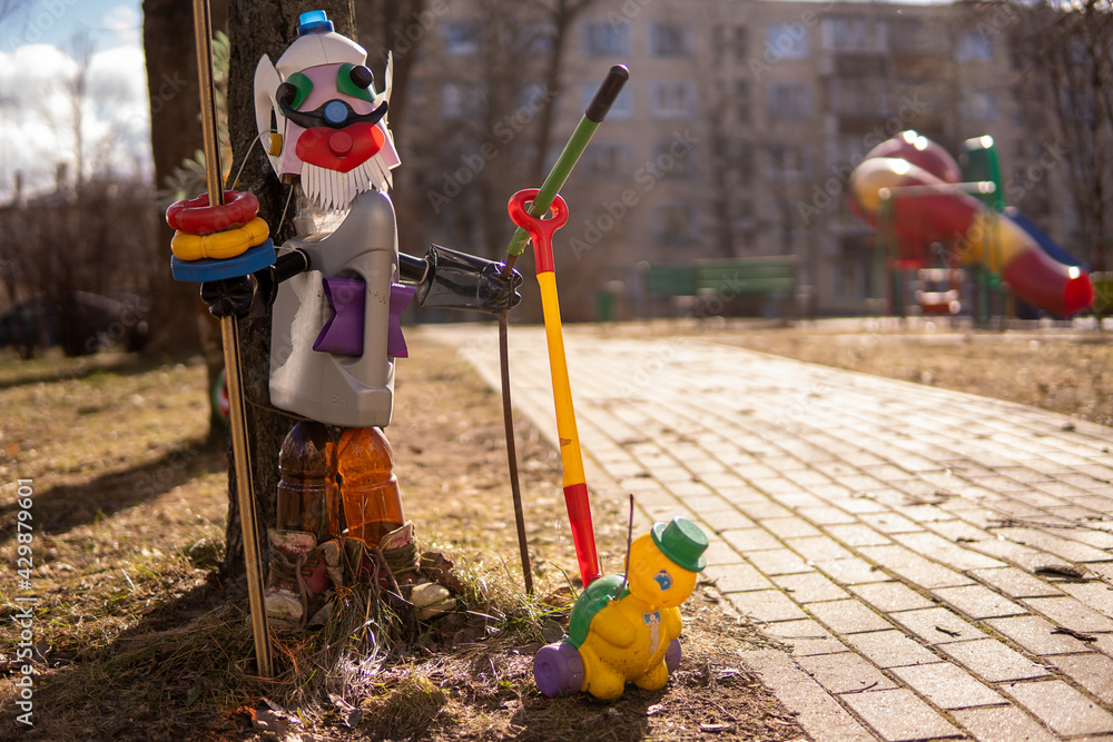 funny doll made of recycled plastic is made from a plastic bottle for ...