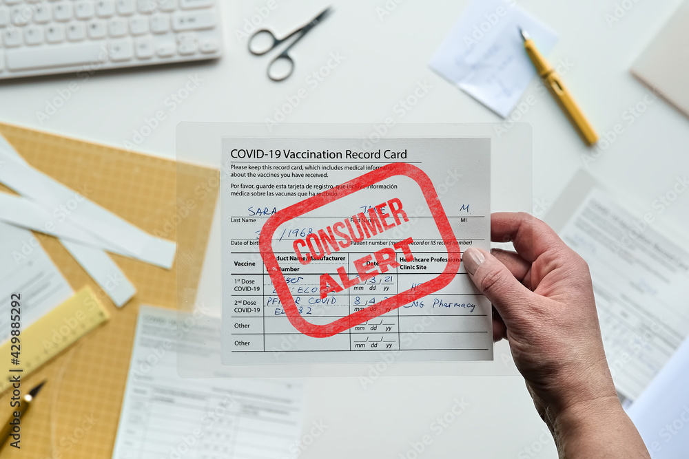 Fake covid vaccination record card. Covid scams. Forged health ...