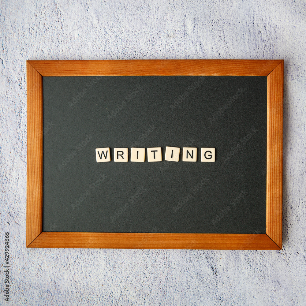 Writing sign of English learning skills written on Blackboard. Chalk ...