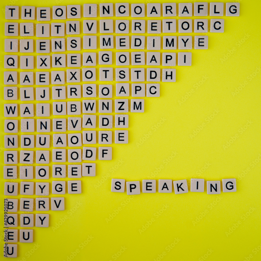 Speaking sign of English learning skills written on yellow paper ...