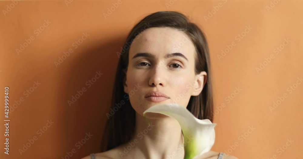 Skin care treatment or cosmetic ads concept. She gently touches her ...