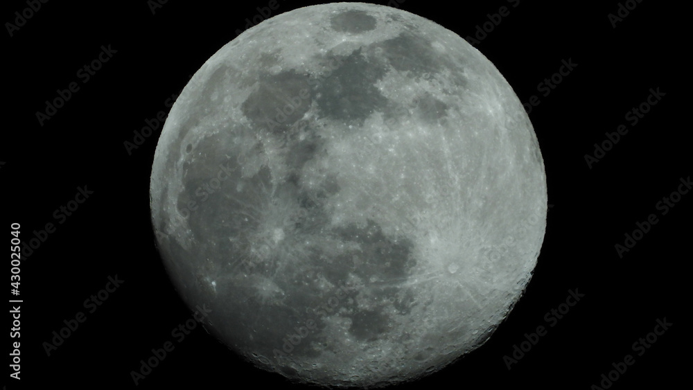 Zoom photo of full moon as seen at night Stock Photo | Adobe Stock