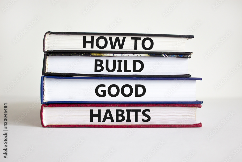 Build good habits symbol. Books with words 'How to build good habits ...