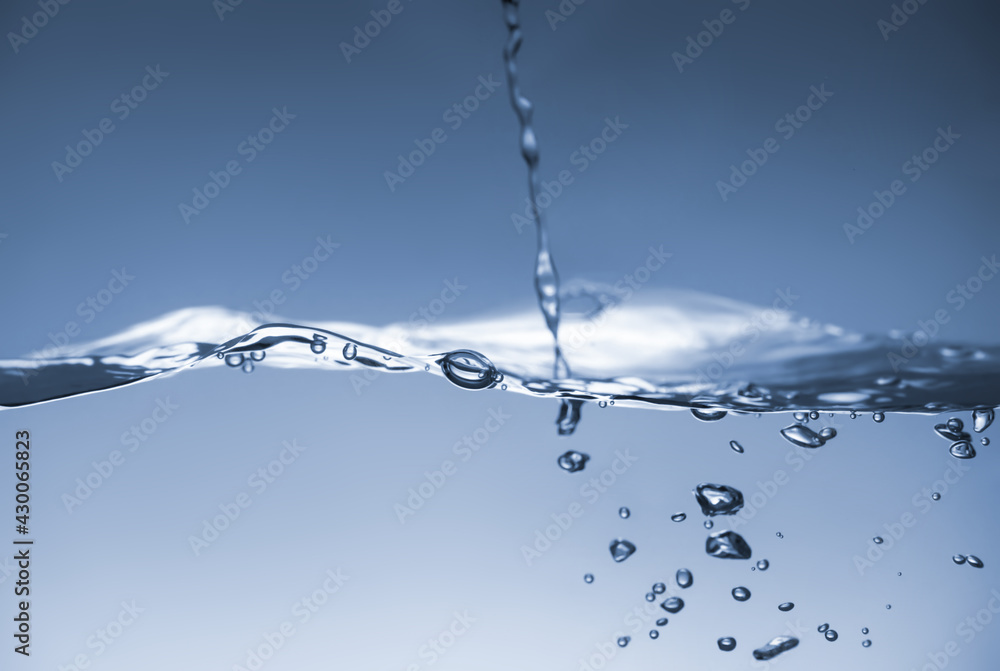 Water splash Aqua flowing in waves and creating bubbles Drops on the ...