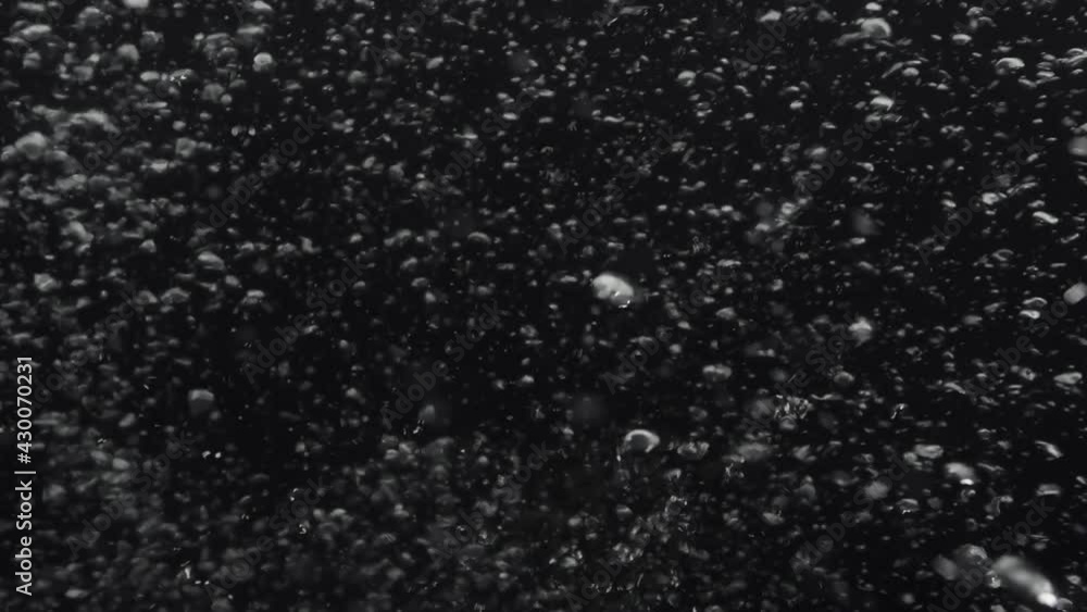 Underwater bubbles mayhem on Black Backgrounds. Illuminated bubbles ...