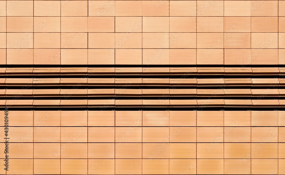 Terracotta tiles panels for ventilated walls or facades. Background and ...