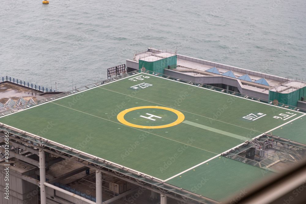 helicopter landing pad on top of building near Victoria Harbour, in ...