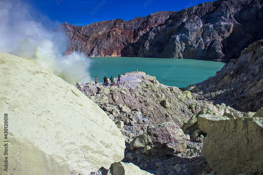 Aerial view of Kawah Ijen acid lake and sulfur mines from the top of ...