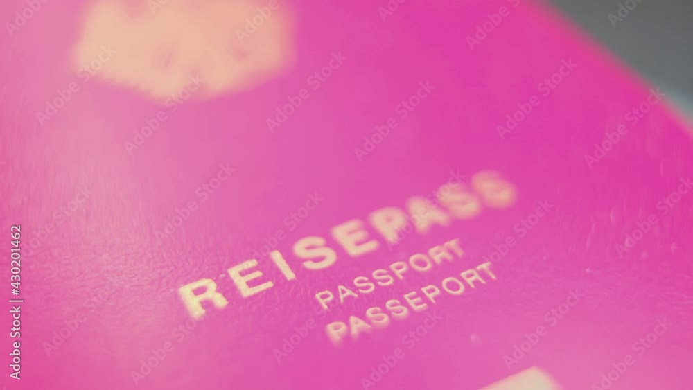 Closeup of German passport. You can read the German word "Reisepass ...