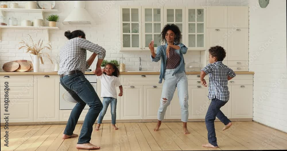 Full length happy active two generations african ethnicity family ...