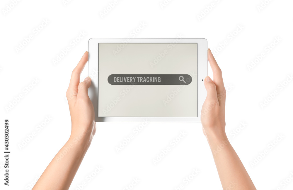 Female hands holding tablet computer with open page of delivery service ...