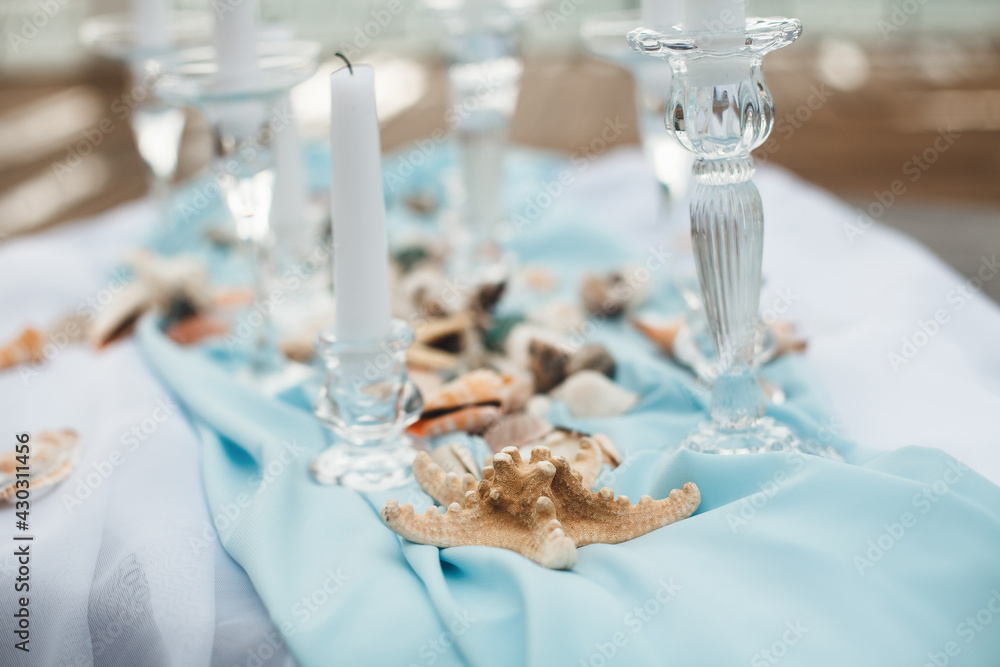 Stylish design of the wedding table in a nautical style. The decor is ...