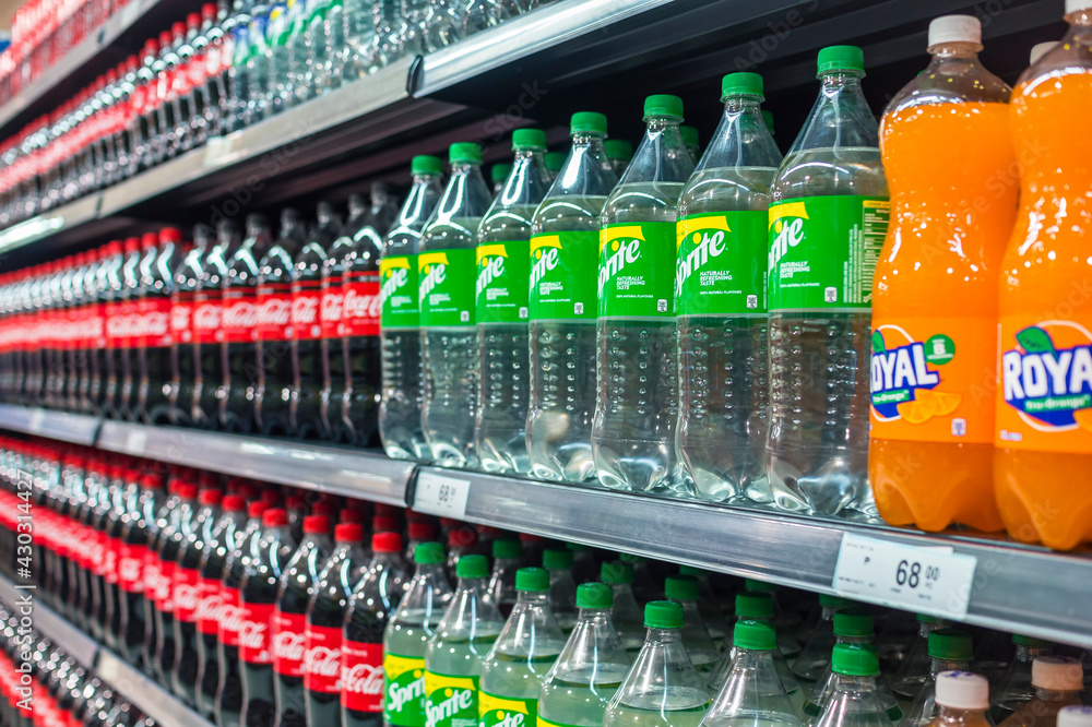 Manila, Philippines - July 2020: A row of Coke products on display at ...