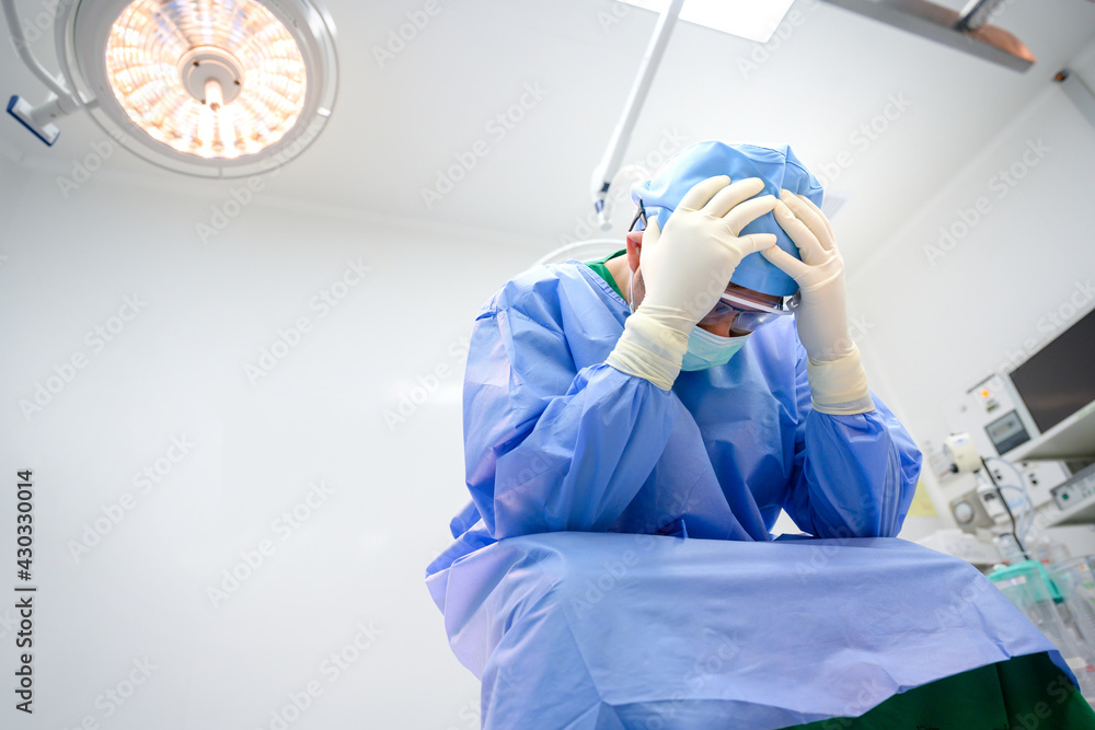 Male doctor sitting sad and feeling stressed I was disappointed with ...