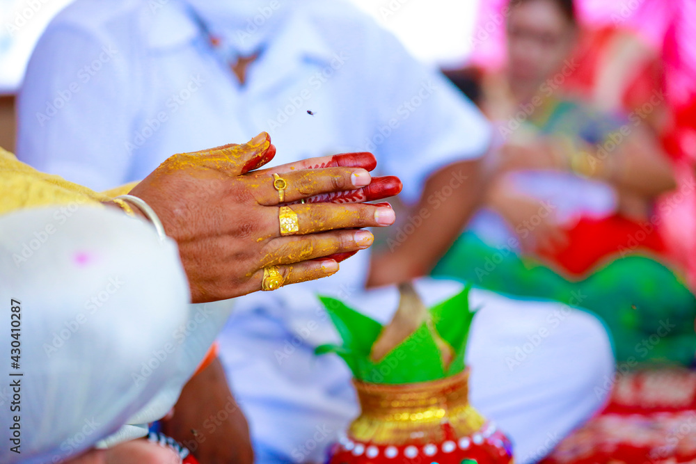 Indian Traditional Wedding: Groom hand in haldi ceremony Stock Photo ...