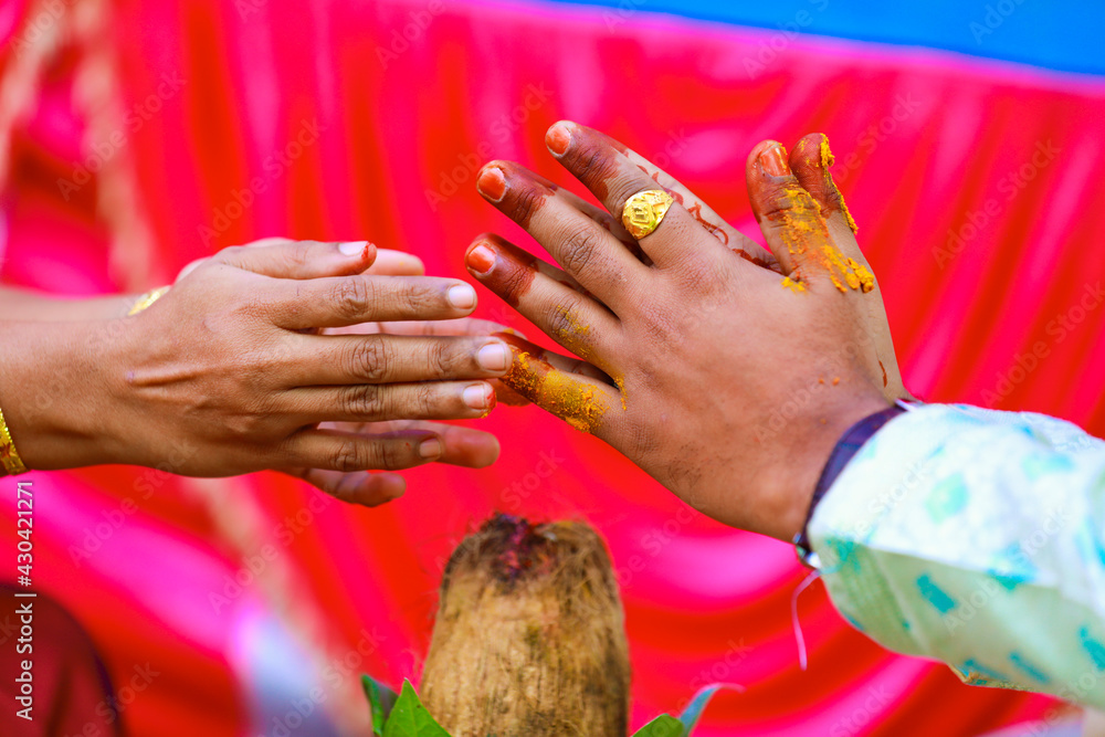 Indian Traditional Wedding: Groom hand in haldi ceremony Stock Photo ...