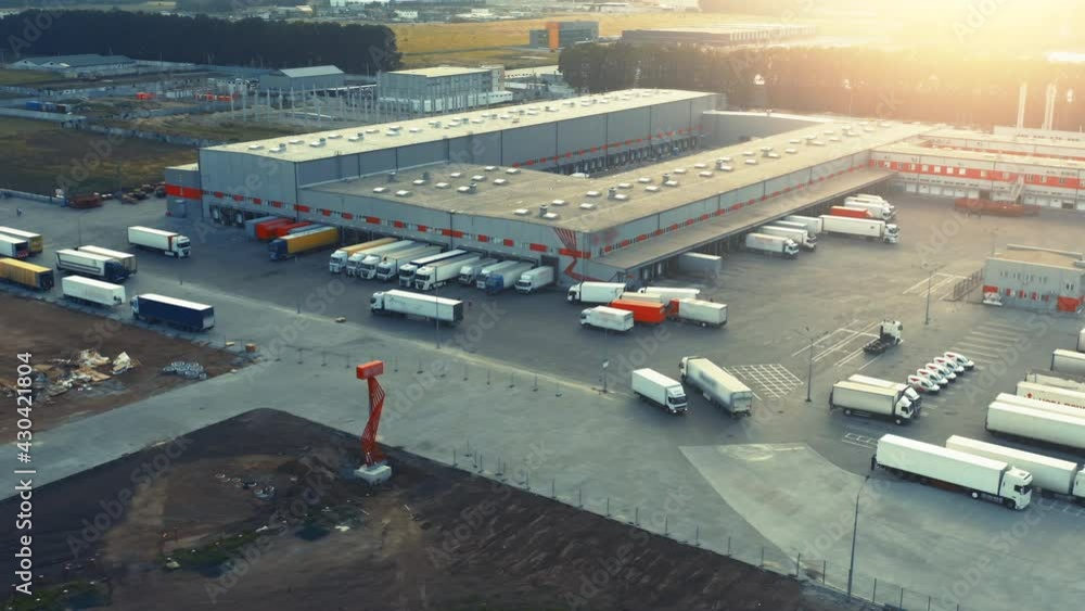 Large logistics park with warehouse and loading hub. Semi-trailers ...