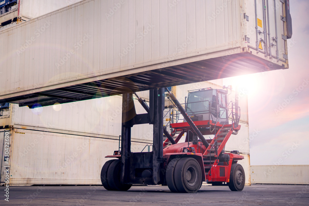 Forklift loading white container box for logistic import export and ...