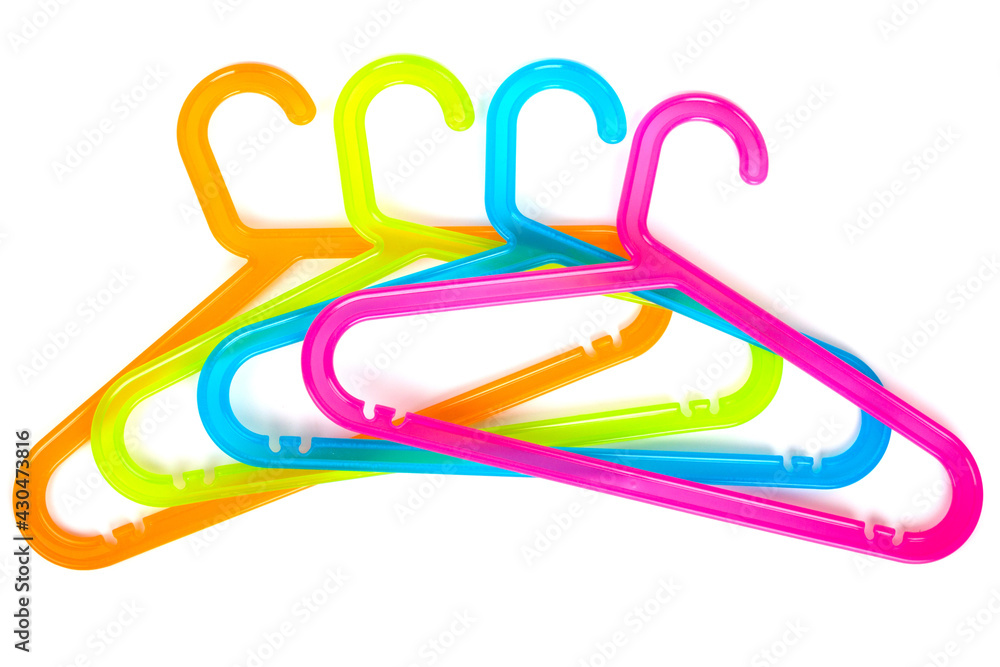 Colored plastic hangers isolated on white background. Storage and sales ...