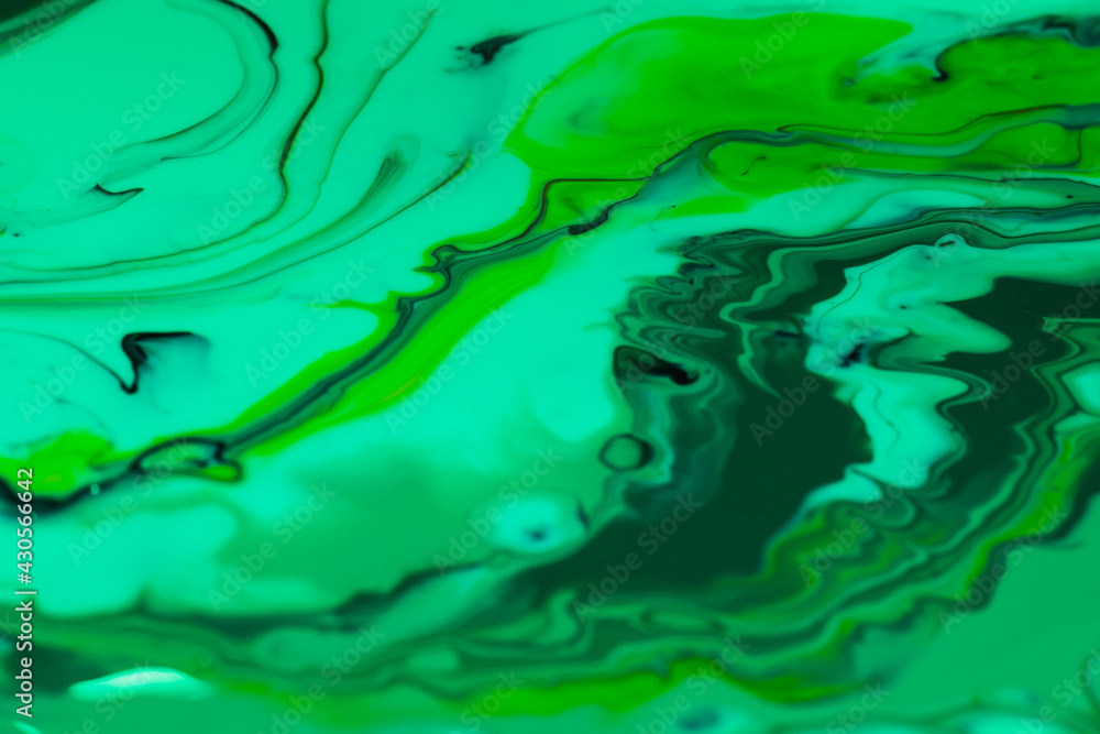 Fluid drawing technique. Green fluid. Grass abstraction. Mixed shades ...