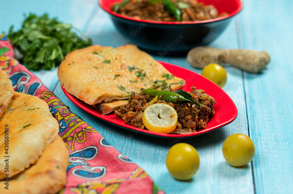 Qeema karahi with vegetable roghni naan India and Pakistan food Stock ...