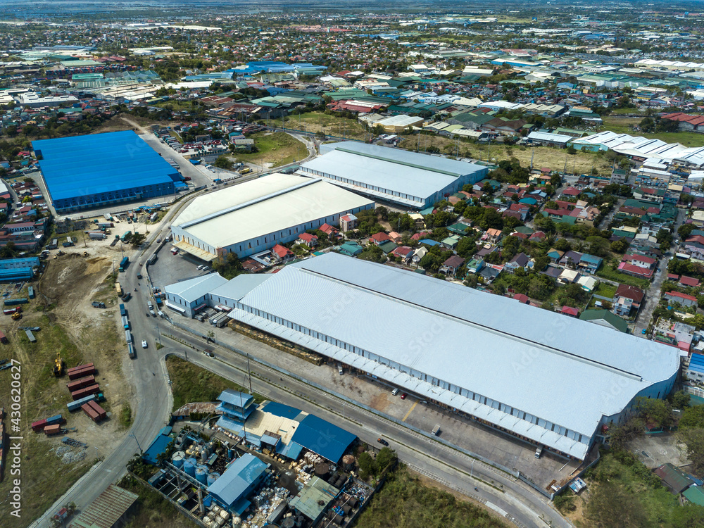 Aerial view of large warehouses and factories north of Metro Manila, in ...