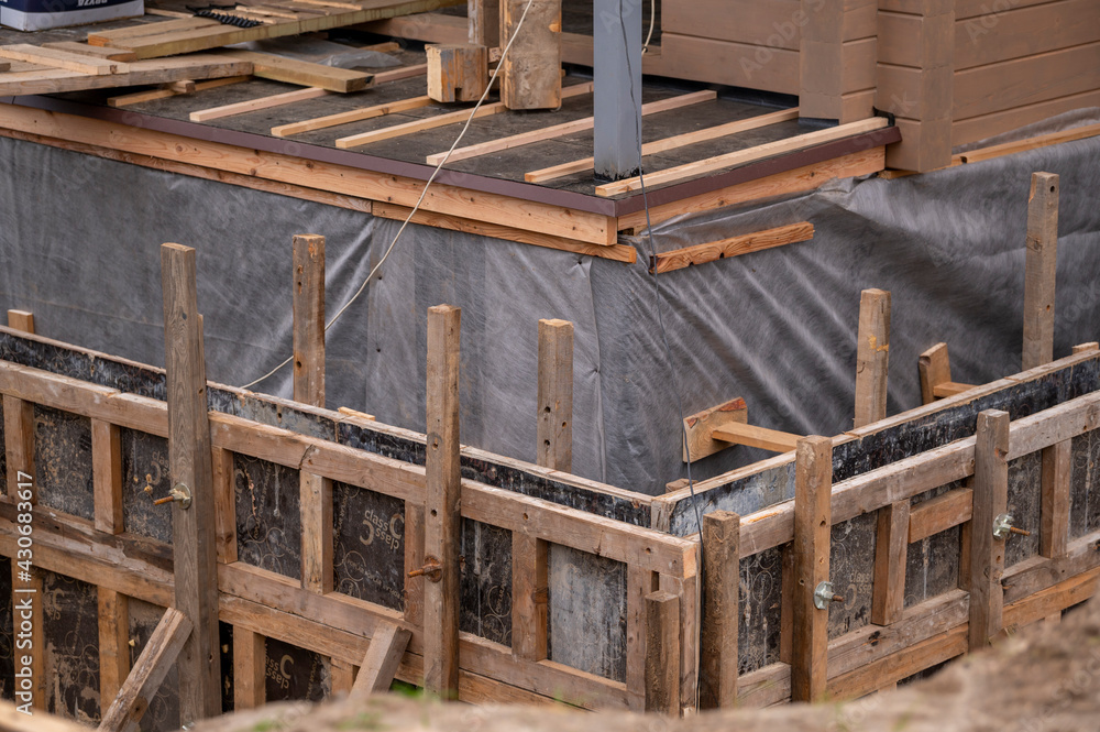 wooden formwork from slabs and planks for pouring the foundation Stock ...